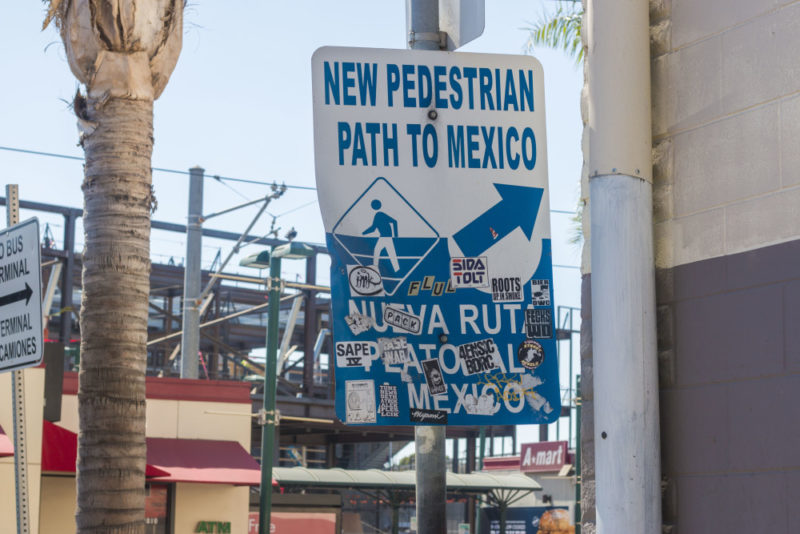 Immigrant Crossing Road Sign San Diego